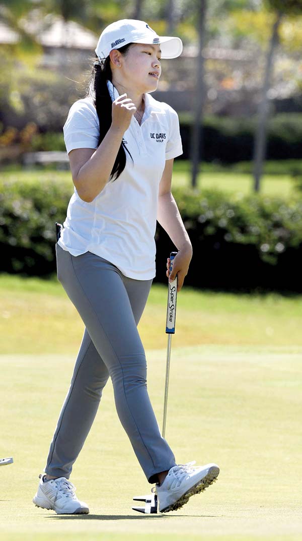 Hannah Sun of UC-Davis reacts after sinking a putt on No. 7 Tuesday ...